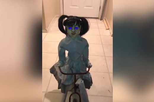 Is this the most terrifying doll ever? Petrifying toy on a trike goes ...