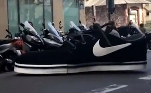 Giant shoe goes for a drive in Paris