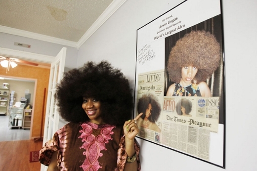 Aevin Dugas sports worlds biggest afro which takes Two Days to wash and dry