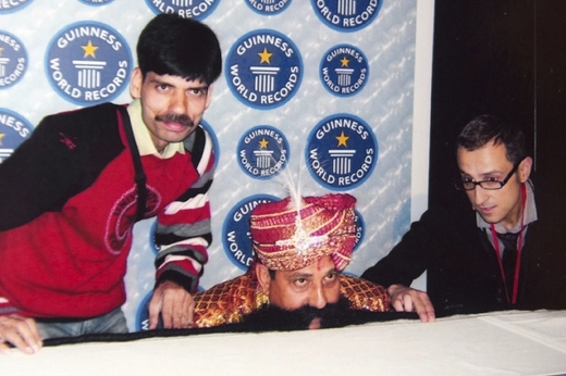Meet the man with the worlds largest moustache measuring 14 feet long